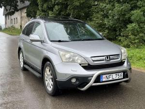 Grey Honda CR-V 2007 in Vilnius, with an engine capacity of 2.20 L and mileage of 300 thousand km for 4200 €, photo 3 on AUTOMOTO.COM.LV
