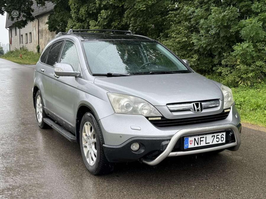 Grey Honda CR-V 2007 in Vilnius, with an engine capacity of 2.20 L and mileage of 300 thousand km for 4200 €, photo 3 on AUTOMOTO.COM.LV
