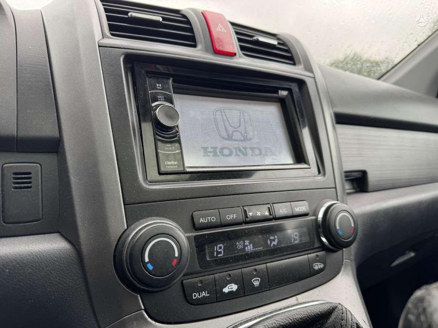 Grey Honda CR-V 2007 in Vilnius, with an engine capacity of 2.20 L and mileage of 300 thousand km for 4200 €, photo 19 on AUTOMOTO.COM.LV