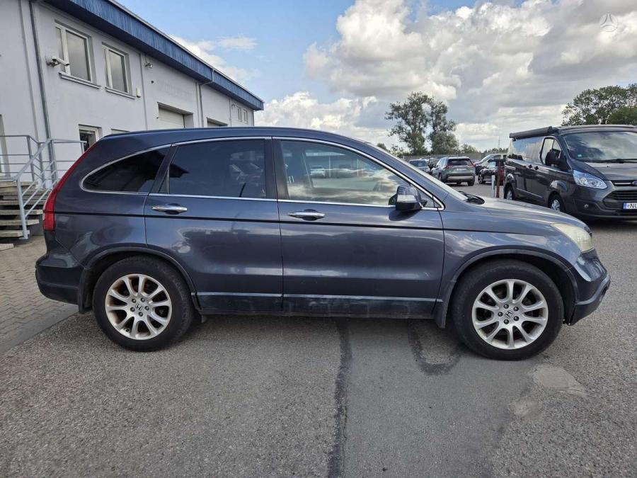 Grey Honda CR-V 2007 in Marijampole, with an engine capacity of 2.20 L and mileage of 277 thousand km for 4199 €, photo 5 on AUTOMOTO.COM.LV
