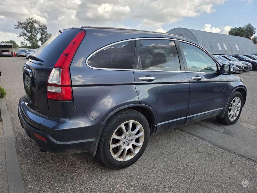 Grey Honda CR-V 2007 in Marijampole, with an engine capacity of 2.20 L and mileage of 277 thousand km for 4199 €, photo 6 on AUTOMOTO.COM.LV