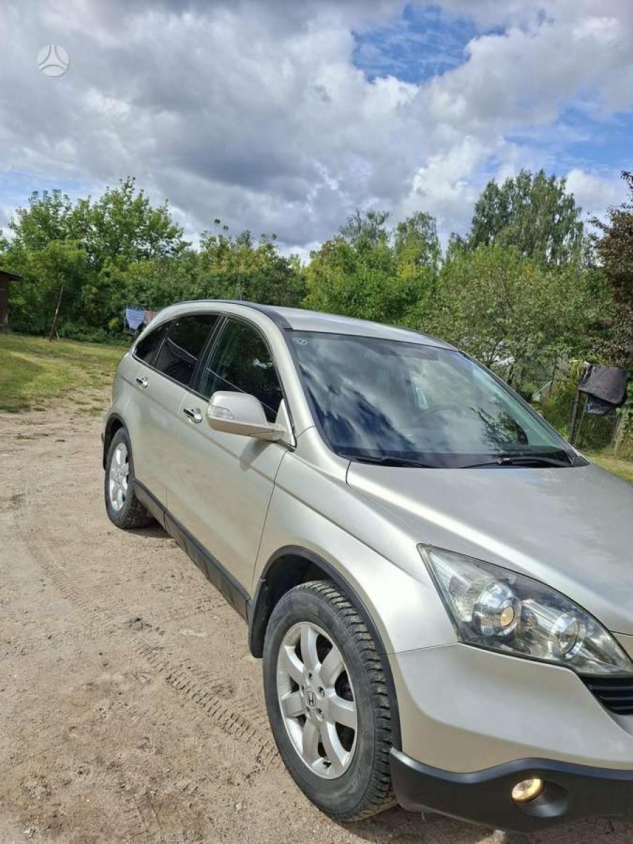 Pelēks Honda CR-V 2007 Viļņa, ar dzinēja tilpumu 2.20 L un nobraukumu 303 tūkst. km par 4000 €, foto 4 vietnē AUTOMOTO.COM.LV