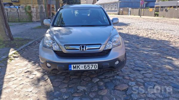 Grey Honda CR-V 2007 in Jelgava, with an engine capacity of 2.20 L and mileage of 253 thousand km for 3700 €, photo 1 on AUTOMOTO.COM.LV