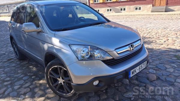 Grey Honda CR-V 2007 in Jelgava, with an engine capacity of 2.20 L and mileage of 253 thousand km for 3700 €, photo 4 on AUTOMOTO.COM.LV