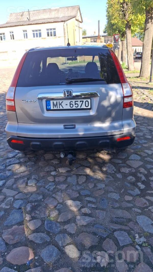Grey Honda CR-V 2007 in Jelgava, with an engine capacity of 2.20 L and mileage of 253 thousand km for 3700 €, photo 7 on AUTOMOTO.COM.LV