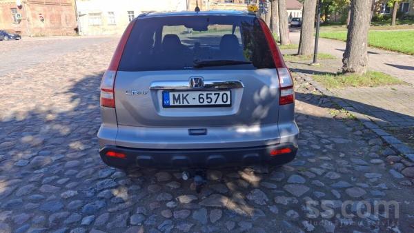 Grey Honda CR-V 2007 in Jelgava, with an engine capacity of 2.20 L and mileage of 253 thousand km for 3700 €, photo 8 on AUTOMOTO.COM.LV