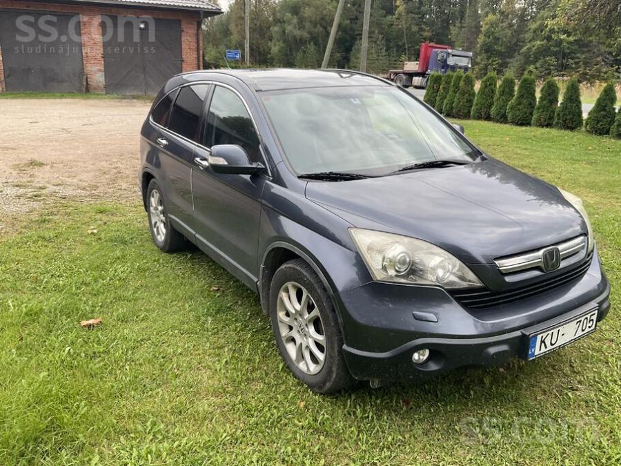 Pelēks Honda CR-V 2007 Valmiera, ar dzinēja tilpumu 2.20 L un nobraukumu 347 tūkst. km par 3500 €, foto 3 vietnē AUTOMOTO.COM.LV