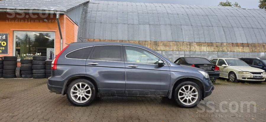 Pelēks Honda CR-V 2007 Valmiera, ar dzinēja tilpumu 2.20 L un nobraukumu 347 tūkst. km par 2200 €, foto 3 vietnē AUTOMOTO.COM.LV