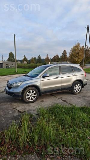 Pelēks Honda CR-V 2007 Ogre, ar dzinēja tilpumu 2.20 L un nobraukumu 374 tūkst. km par 3000 €, foto  vietnē AUTOMOTO.COM.LV