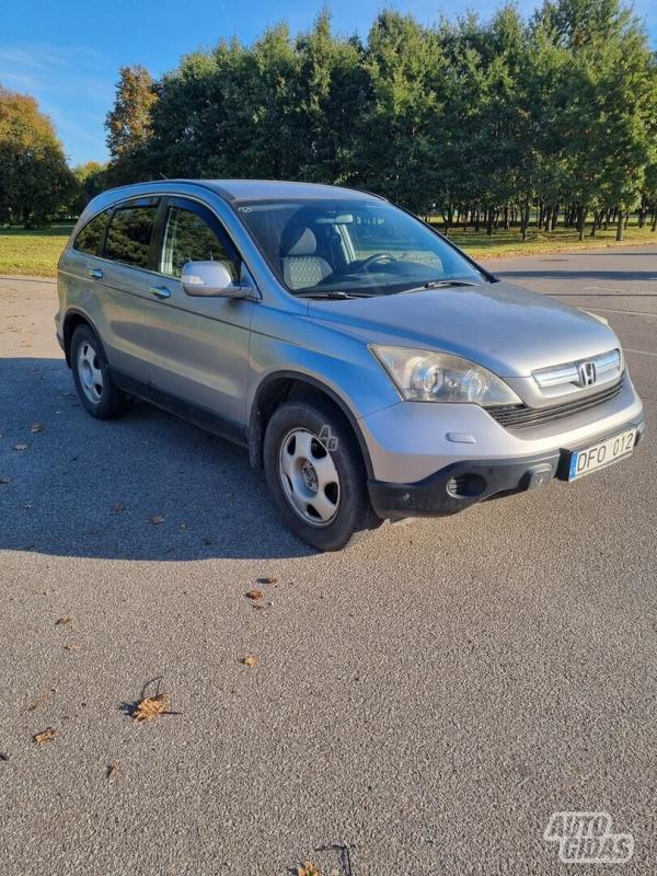 Pelēks Honda CR-V 2007 Panevēža, ar dzinēja tilpumu 2.00 L un nobraukumu 560 tūkst. km par 2000 €, foto 1 vietnē AUTOMOTO.COM.LV