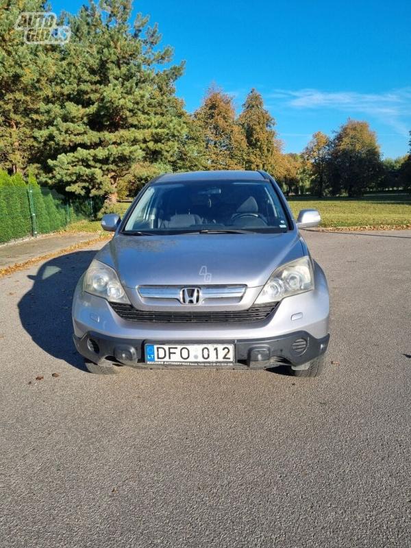 Pelēks Honda CR-V 2007 Panevēža, ar dzinēja tilpumu 2.00 L un nobraukumu 560 tūkst. km par 2000 €, foto 3 vietnē AUTOMOTO.COM.LV
