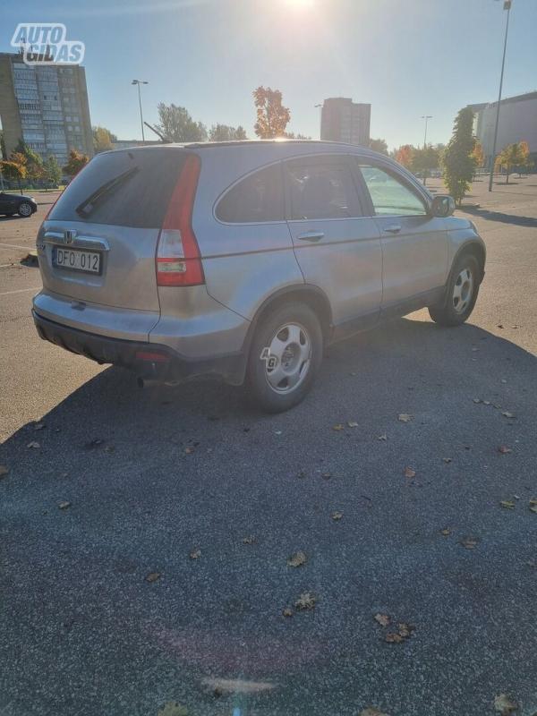 Pelēks Honda CR-V 2007 Panevēža, ar dzinēja tilpumu 2.00 L un nobraukumu 560 tūkst. km par 2000 €, foto 6 vietnē AUTOMOTO.COM.LV