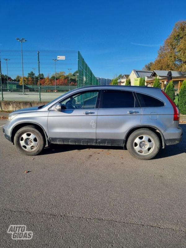 Pelēks Honda CR-V 2007 Panevēža, ar dzinēja tilpumu 2.00 L un nobraukumu 560 tūkst. km par 2000 €, foto 9 vietnē AUTOMOTO.COM.LV