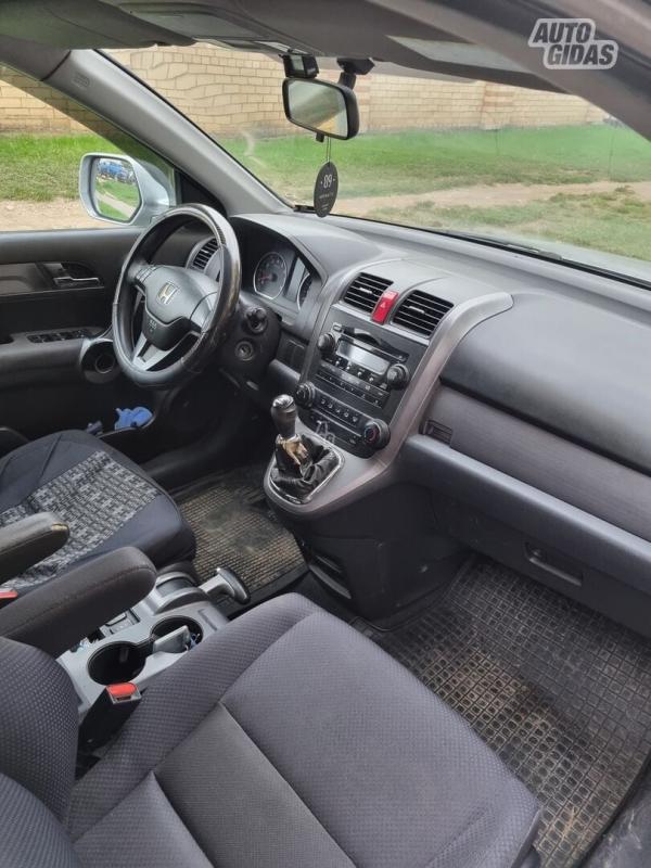 Pelēks Honda CR-V 2007 Panevēža, ar dzinēja tilpumu 2.00 L un nobraukumu 560 tūkst. km par 2000 €, foto 10 vietnē AUTOMOTO.COM.LV