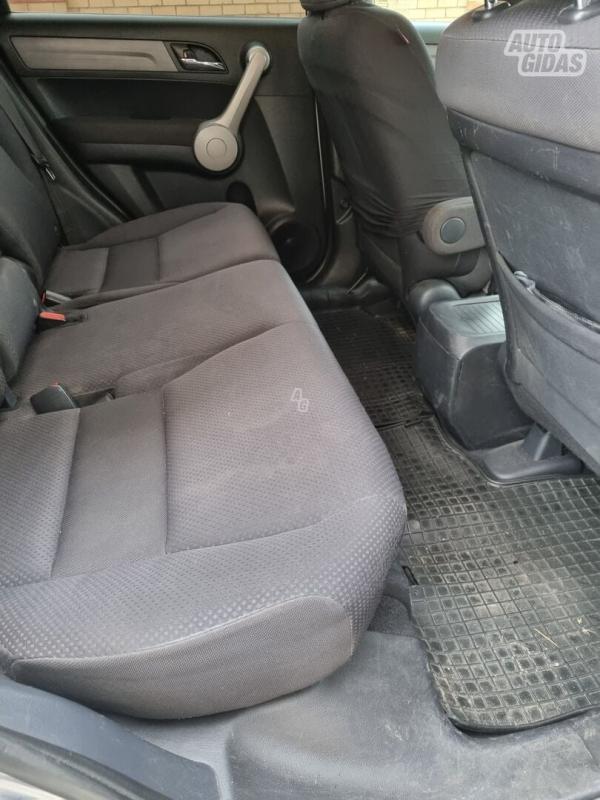Pelēks Honda CR-V 2007 Panevēža, ar dzinēja tilpumu 2.00 L un nobraukumu 560 tūkst. km par 2000 €, foto 11 vietnē AUTOMOTO.COM.LV