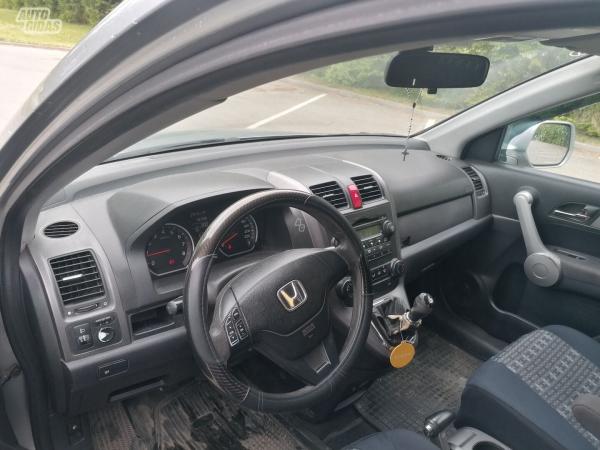 Pelēks Honda CR-V 2008 Viļņa, ar dzinēja tilpumu 2.00 L un nobraukumu 524 tūkst. km par 2600 €, foto 9 vietnē AUTOMOTO.COM.LV