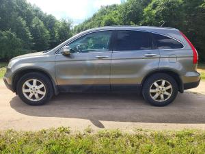 Grey Honda CR-V 2008 in Plunge, with an engine capacity of 2.20 L and mileage of 243 thousand km for 2500 €, photo 3 on AUTOMOTO.COM.LV