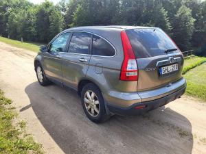 Grey Honda CR-V 2008 in Plunge, with an engine capacity of 2.20 L and mileage of 243 thousand km for 2500 €, photo 4 on AUTOMOTO.COM.LV
