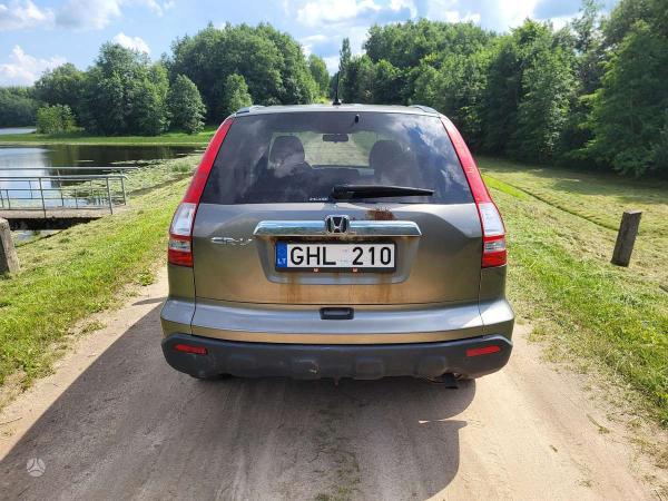 Pelēks Honda CR-V 2008 Plungė, ar dzinēja tilpumu 2.20 L un nobraukumu 243 tūkst. km par 2500 €, foto 4 vietnē AUTOMOTO.COM.LV