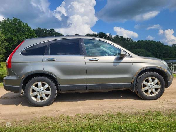 Pelēks Honda CR-V 2008 Plungė, ar dzinēja tilpumu 2.20 L un nobraukumu 243 tūkst. km par 2500 €, foto 6 vietnē AUTOMOTO.COM.LV
