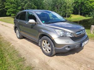 Grey Honda CR-V 2008 in Plunge, with an engine capacity of 2.20 L and mileage of 243 thousand km for 2500 €, photo 8 on AUTOMOTO.COM.LV