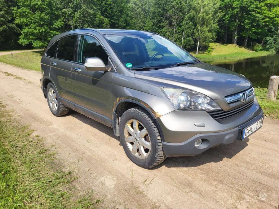Grey Honda CR-V 2008 in Plunge, with an engine capacity of 2.20 L and mileage of 243 thousand km for 2500 €, photo 8 on AUTOMOTO.COM.LV