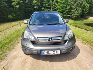 Grey Honda CR-V 2008 in Plunge, with an engine capacity of 2.20 L and mileage of 243 thousand km for 2500 €, photo 9 on AUTOMOTO.COM.LV