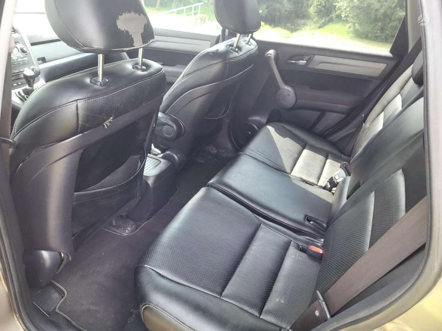 Grey Honda CR-V 2008 in Plunge, with an engine capacity of 2.20 L and mileage of 243 thousand km for 2500 €, photo 14 on AUTOMOTO.COM.LV