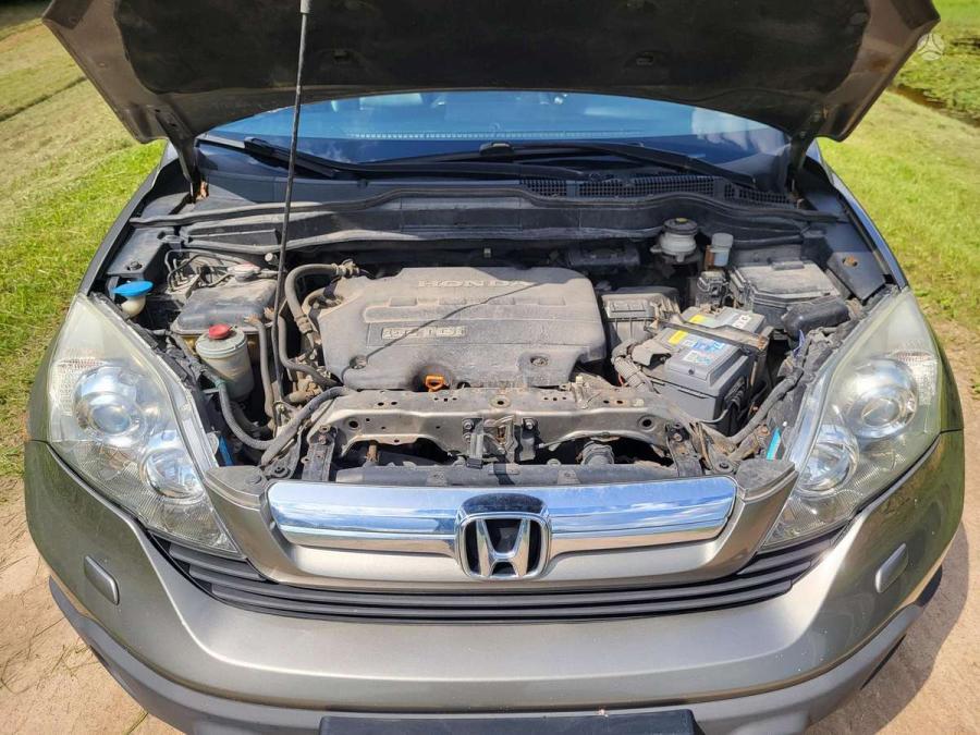 Grey Honda CR-V 2008 in Plunge, with an engine capacity of 2.20 L and mileage of 243 thousand km for 2500 €, photo 18 on AUTOMOTO.COM.LV