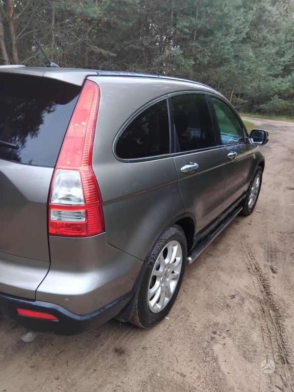Grey Honda CR-V 2008 in Vilnius, with an engine capacity of 2.20 L and mileage of 294 thousand km for 4250 €, photo 4 on AUTOMOTO.COM.LV