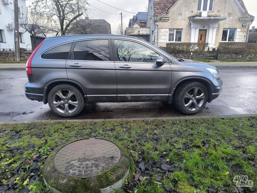 Grey Honda CR-V 2009 in Siauliai, with an engine capacity of 2.20 L and mileage of 299 thousand km for 4500 €, photo 2 on AUTOMOTO.COM.LV