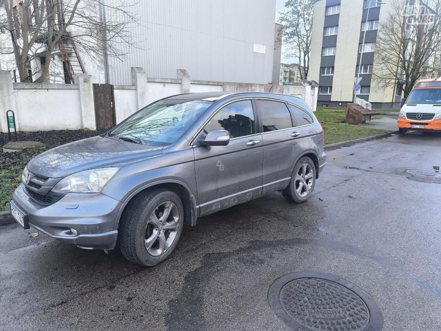 Grey Honda CR-V 2009 in Siauliai, with an engine capacity of 2.20 L and mileage of 299 thousand km for 4500 €, photo 3 on AUTOMOTO.COM.LV