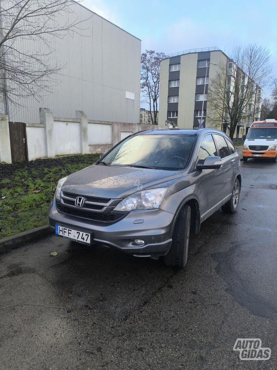 Grey Honda CR-V 2009 in Siauliai, with an engine capacity of 2.20 L and mileage of 299 thousand km for 4500 €, photo 4 on AUTOMOTO.COM.LV