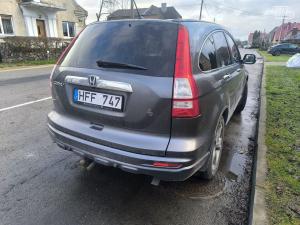 Grey Honda CR-V 2009 in Siauliai, with an engine capacity of 2.20 L and mileage of 299 thousand km for 4500 €, photo 6 on AUTOMOTO.COM.LV