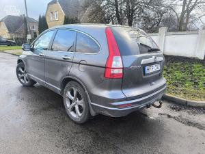 Grey Honda CR-V 2009 in Siauliai, with an engine capacity of 2.20 L and mileage of 299 thousand km for 4500 €, photo 7 on AUTOMOTO.COM.LV