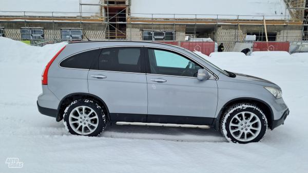Grey Honda CR-V 2009 in Klaipeda, with an engine capacity of 2.20 L and mileage of 292 thousand km for 6200 €, photo 6 on AUTOMOTO.COM.LV