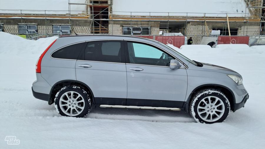Grey Honda CR-V 2009 in Klaipeda, with an engine capacity of 2.20 L and mileage of 292 thousand km for 6200 €, photo 6 on AUTOMOTO.COM.LV