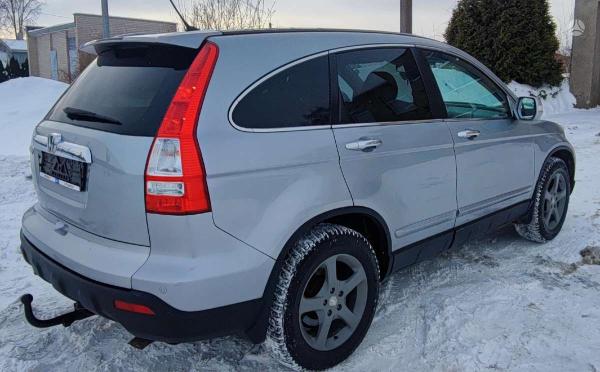 Grey Honda CR-V 2009 in Siauliai, with an engine capacity of 2.20 L and mileage of 380 thousand km for 5600 €, photo 7 on AUTOMOTO.COM.LV