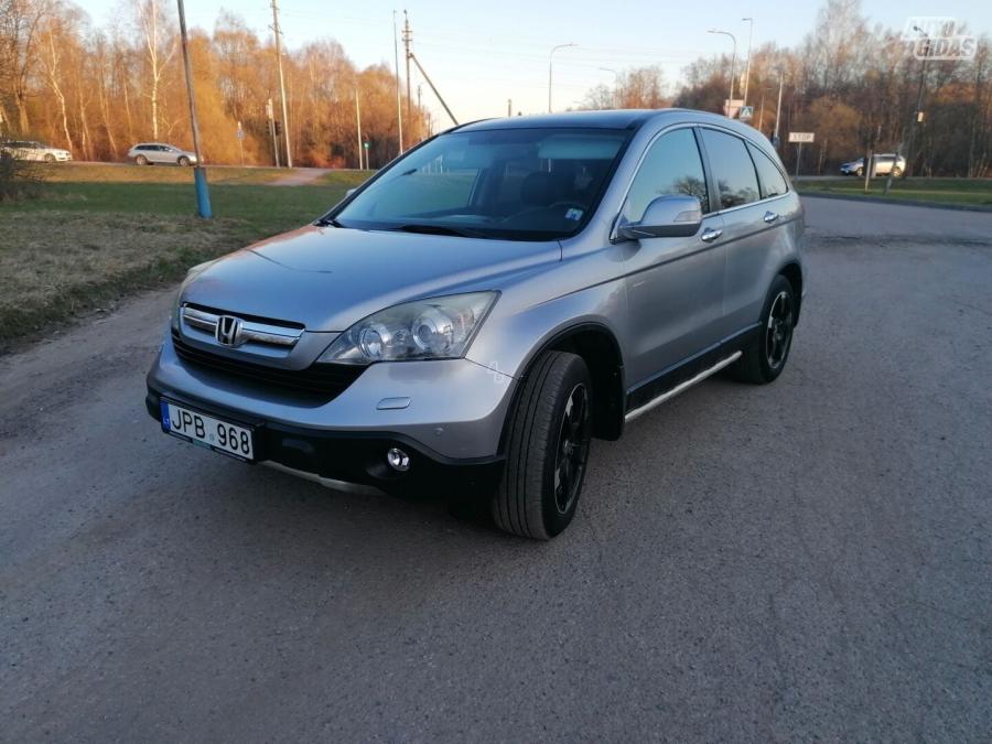 Grey Honda CR-V 2009 in Utena, with an engine capacity of 2.20 L and mileage of 358 thousand km for 3750 €, photo 1 on AUTOMOTO.COM.LV