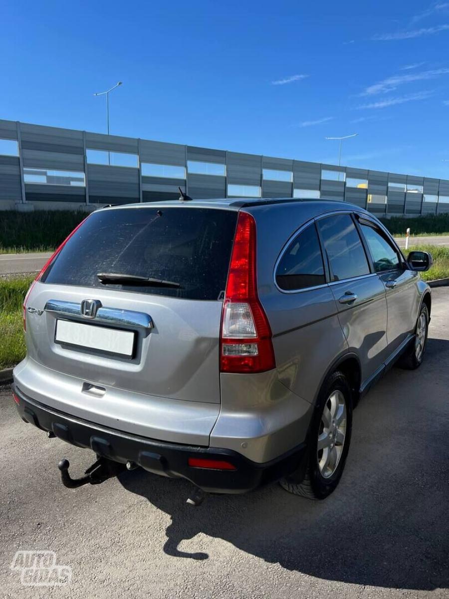 Grey Honda CR-V 2009 in Marijampole, with an engine capacity of 2.20 L and mileage of 320 thousand km for 3900 €, photo 4 on AUTOMOTO.COM.LV