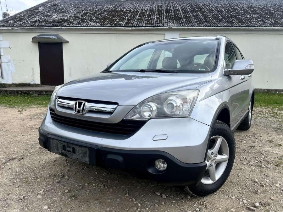Grey Honda CR-V 2009 in Kaisiadorys, with an engine capacity of 2.20 L and mileage of 293 thousand km for 3850 €, photo 1 on AUTOMOTO.COM.LV