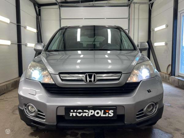Grey Honda CR-V 2009 in Panevezys, with an engine capacity of 2.20 L and mileage of 387 thousand km for 4300 €, photo 2 on AUTOMOTO.COM.LV
