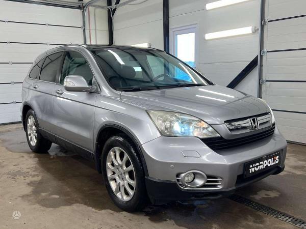 Grey Honda CR-V 2009 in Panevezys, with an engine capacity of 2.20 L and mileage of 387 thousand km for 4300 €, photo 6 on AUTOMOTO.COM.LV