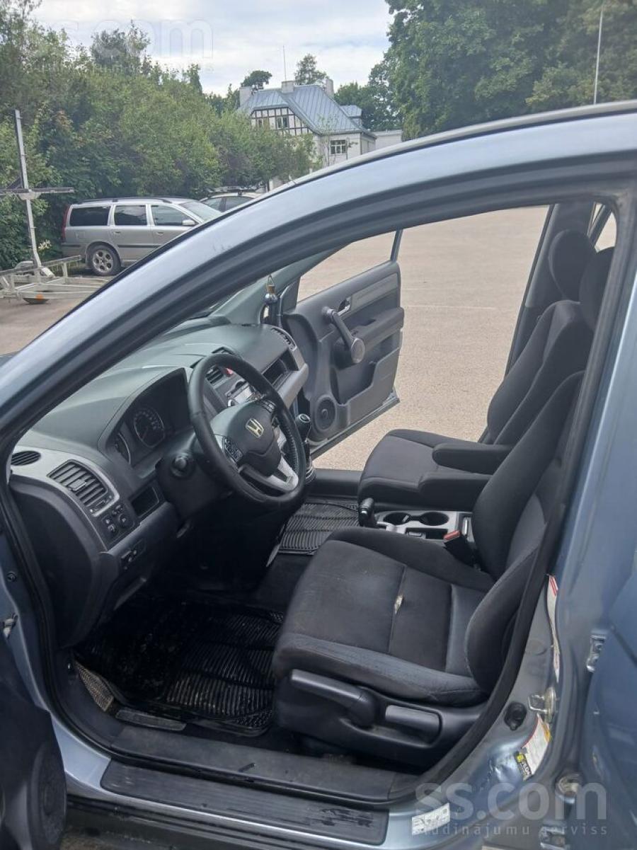 Pelēks Honda CR-V 2009 Ogre, ar dzinēja tilpumu 2.00 L un nobraukumu 434 tūkst. km par 1800 €, foto 4 vietnē AUTOMOTO.COM.LV