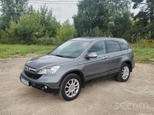 Grey Honda CR-V 2009 in Riga, with an engine capacity of 2.00 L and mileage of 201 thousand km for 6900 €, photo  on AUTOMOTO.COM.LV