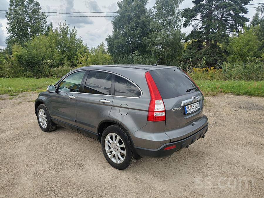 Grey Honda CR-V 2009 in Riga, with an engine capacity of 2.00 L and mileage of 201 thousand km for 6900 €, photo 12 on AUTOMOTO.COM.LV