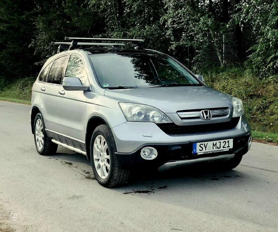 Grey Honda CR-V 2009 in Vilnius, with an engine capacity of 2.20 L and mileage of 268 thousand km for 5850 €, photo 3 on AUTOMOTO.COM.LV