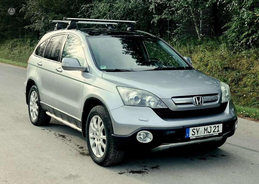 Grey Honda CR-V 2009 in Vilnius, with an engine capacity of 2.20 L and mileage of 268 thousand km for 5850 €, photo 4 on AUTOMOTO.COM.LV