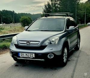 Grey Honda CR-V 2009 in Vilnius, with an engine capacity of 2.20 L and mileage of 268 thousand km for 5850 €, photo 6 on AUTOMOTO.COM.LV