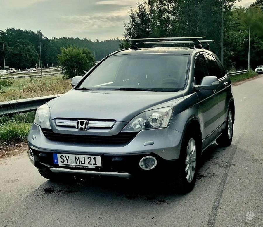 Grey Honda CR-V 2009 in Vilnius, with an engine capacity of 2.20 L and mileage of 268 thousand km for 5850 €, photo 6 on AUTOMOTO.COM.LV